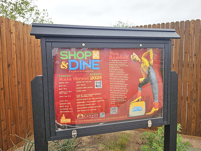 Community bulletin boards keep visitors informed about local events, because even giant cowboy attractions need good neighborhood communication networks.