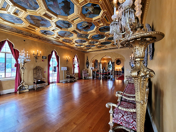 The ballroom's ceiling tells stories in gold and paint, while crystal chandeliers dangle like exclamation points in this architectural sentence.