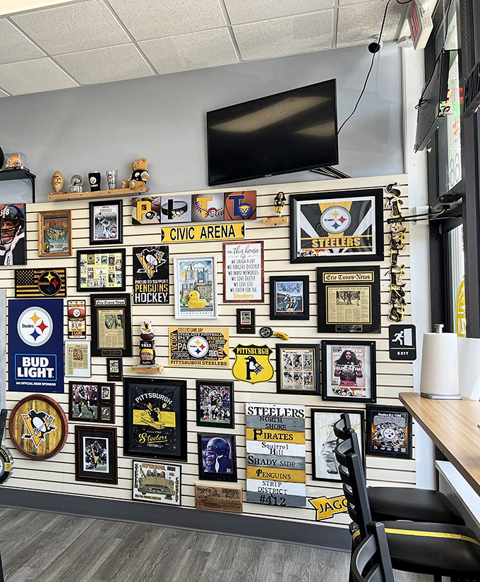 Every inch of wall space celebrates Pittsburgh sports history, creating an atmosphere where even the pizza seems to cheer for the home team.