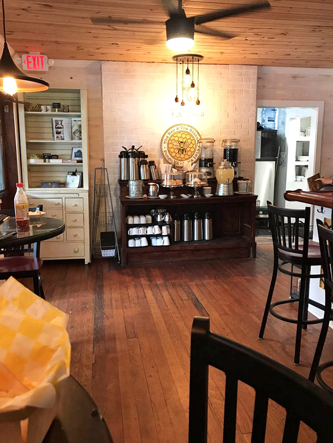Wooden floors, pendant lighting, and a coffee station that says, "Yes, we take the morning brew as seriously as you do."