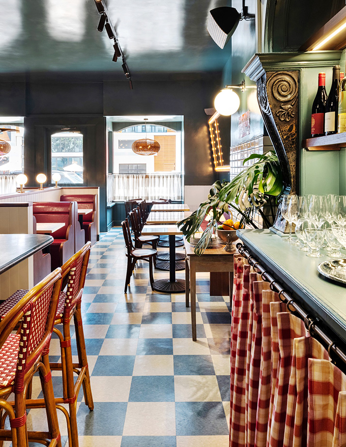 The checkerboard floor isn't playing games, but it is setting the stage for some serious culinary chess moves from the kitchen.