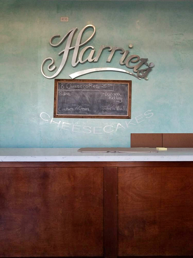 The elegant script of "Harriet's" against that soothing turquoise wall feels like walking into someone's cherished family kitchen rather than a commercial bakery.