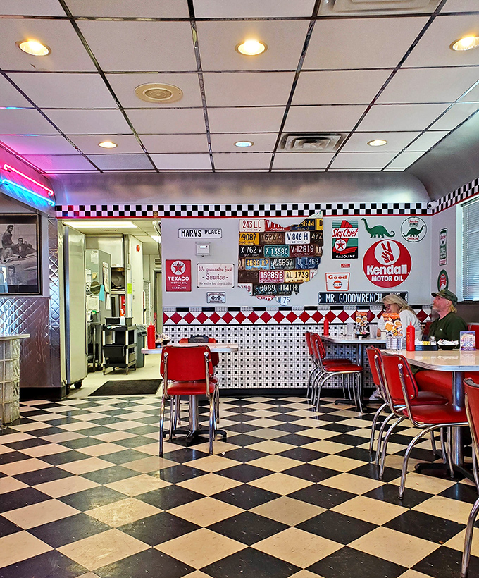 The diner's interior feels like a movie set where the plot always ends with satisfied customers and pants that fit just a little tighter.