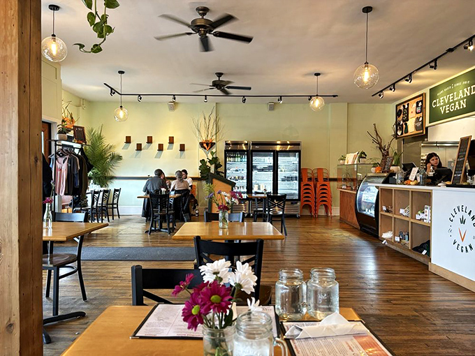 The dining room feels like the living room of that friend who has impeccable taste but never makes you feel underdressed. Fresh flowers and natural light make plant-based eating feel like a celebration.