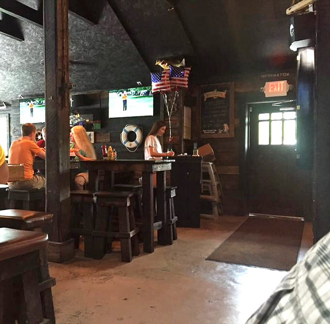 The rustic interior with its nautical touches and TVs creates that perfect "neighborhood joint" vibe where everyone feels like a regular by dessert.