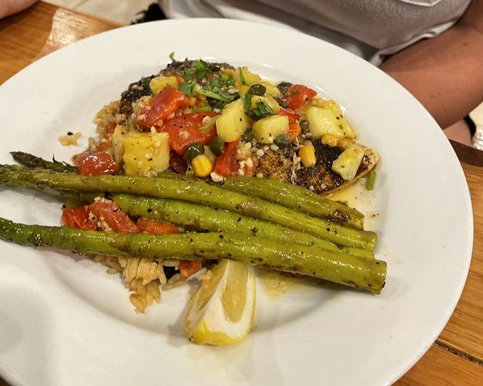 This blackened fish with tropical salsa isn't just dinner &ndash; it's Florida sunshine on a plate. The asparagus provides the perfect counterpoint to all that flavor.