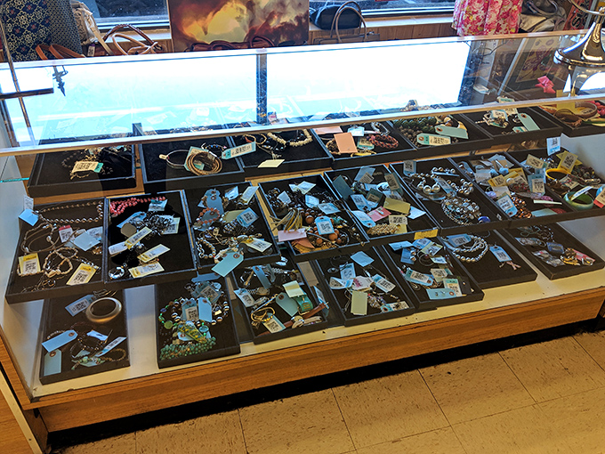 The jewelry counter gleams with potential treasures. One person's discarded accessory becomes another's conversation-starting statement piece.