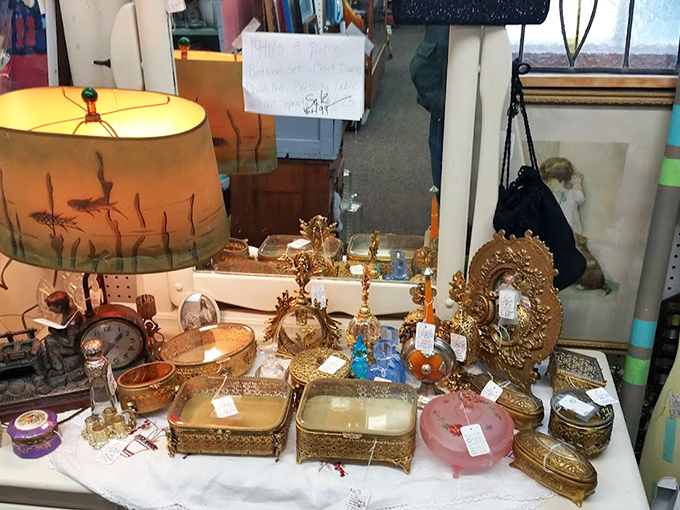 A tableau of golden treasures that would make King Midas jealous&mdash;that vintage lamp casting the kind of glow Instagram filters try to replicate.