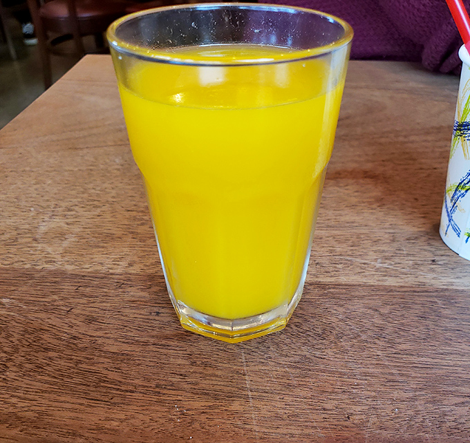 Fresh-squeezed orange juice that makes store-bought look like a sad impersonation. Liquid sunshine in a glass, no filter needed.