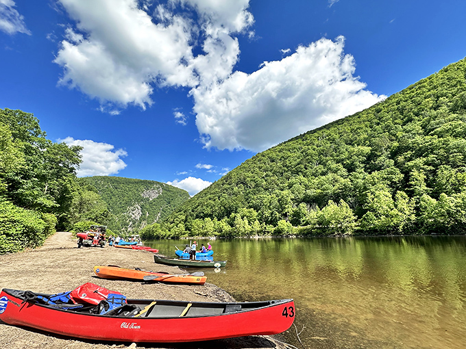 Colorful canoes line the shore like a rainbow that fell into the water, waiting to carry you into postcard-worthy scenery.
