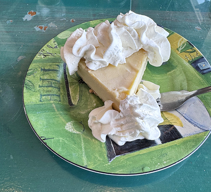 Key lime pie that hits all the right notes: sweet, tart, creamy, and topped with enough whipped cream to make your cardiologist wince.