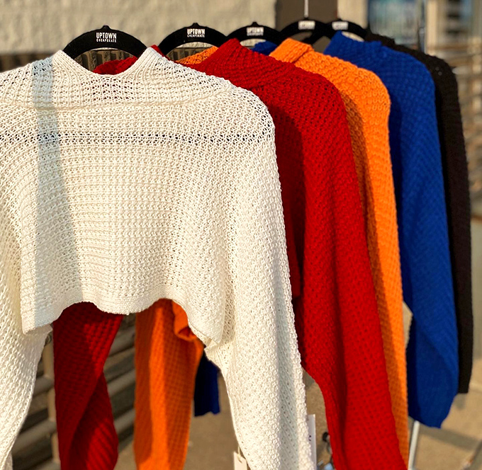Cropped sweaters in every hue imaginable—like a knitted rainbow waiting to brighten up Ohio's notoriously gray winter days.