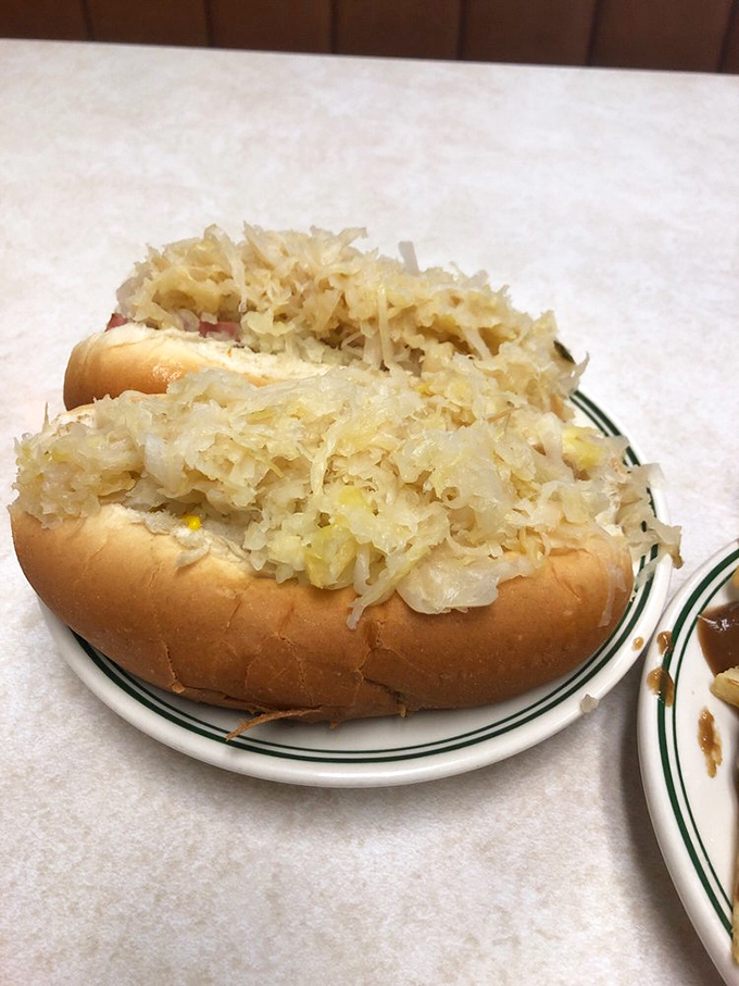 Sauerkraut so generous it's practically a vegetable serving. These dogs aren't just topped&mdash;they're completely committed to the kraut lifestyle.