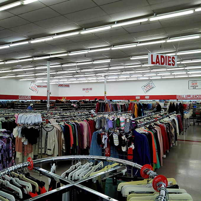 Overhead signs guide shoppers through this textile wilderness. Without them, you might wander for days before finding the men's sweater section. 