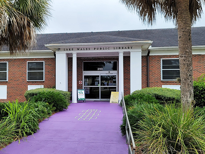 With its welcoming purple walkway, the Lake Wales Public Library invites bookworms and knowledge-seekers alike into its brick-and-mortar embrace of literary treasures.
