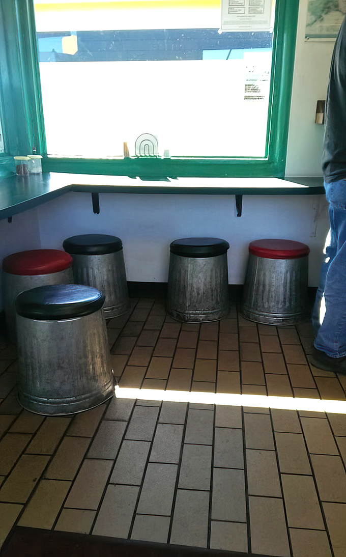 Counter seating transforms strangers into friends, united by appreciation for exceptional sandwiches and shared discovery.