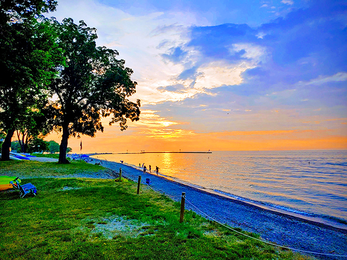 Lake Erie sunsets transform ordinary moments into extraordinary memories, painting the sky in colors that no filter could improve upon.