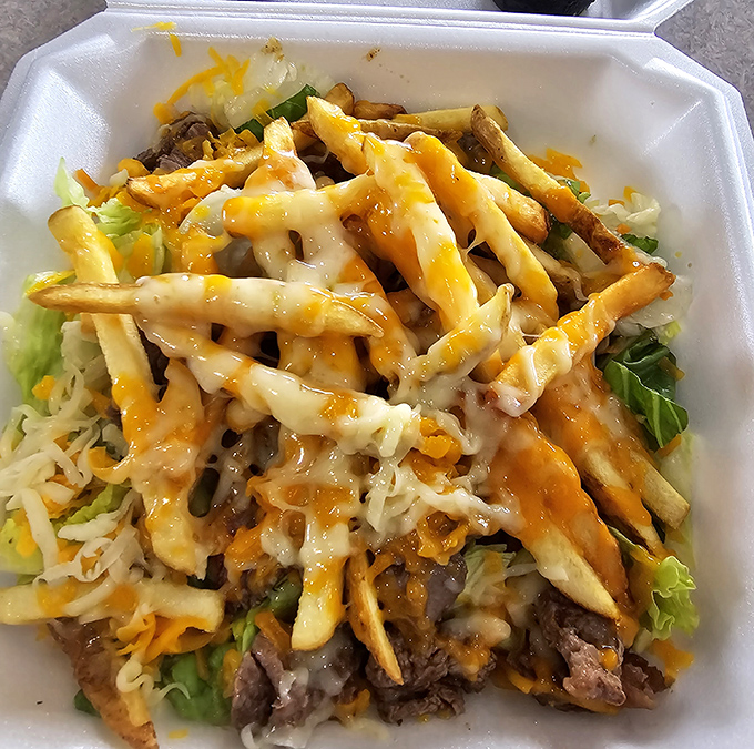 These loaded fries aren't just a side dish&mdash;they're a main event. A beautiful mess of cheese, meat, and veggies that demands to be shared but rarely is.