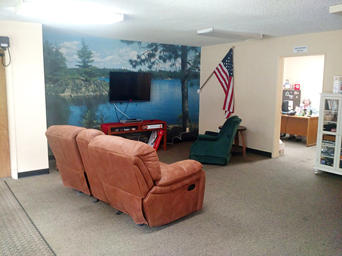 The community room offers a cozy spot to rest between bargain hunts, complete with a mural that brings the outdoors inside.