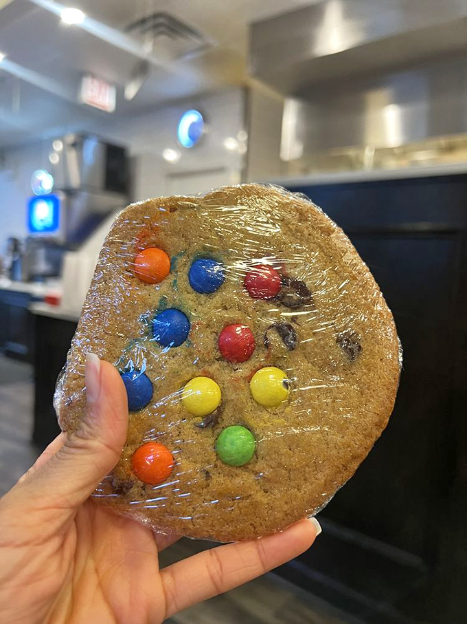 An M&M cookie that looks like it was designed by a committee of your inner child and your adult sweet tooth. Nostalgia never tasted so good.