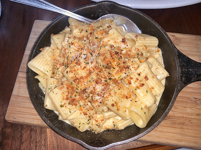 Mac and cheese in a cast iron skillet&mdash;because sometimes the universe knows exactly what your soul needs before you do.