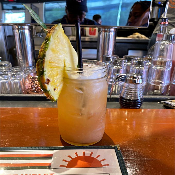This tropical cocktail, garnished with fresh pineapple, isn't just a drink&mdash;it's a vacation in a mason jar.