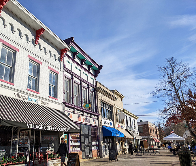 Main Street's colorful facades and striped awnings create the perfect backdrop for an afternoon of boutique browsing and coffee sipping.