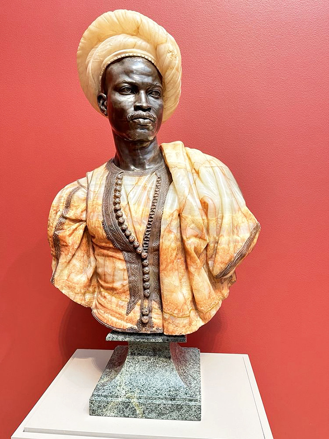 This striking bust of a Sudanese man in Algerian dress captures dignity and presence that transcends time and cultural boundaries.