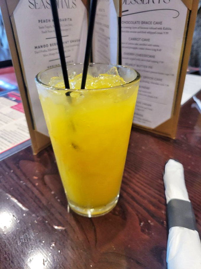 A sunshine-yellow cocktail that promises vacation vibes even on a Tuesday in Pennsylvania. One sip and you're mentally beach-bound.
