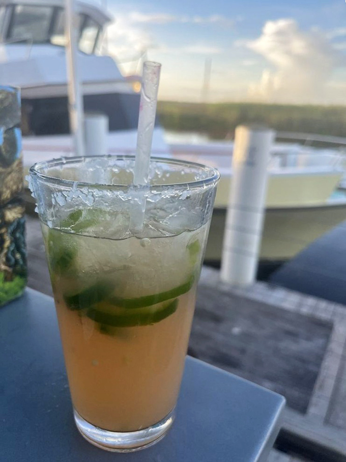 This blue cocktail captures the Gulf sky in liquid form, complete with citrus garnish worthy of Instagram fame.