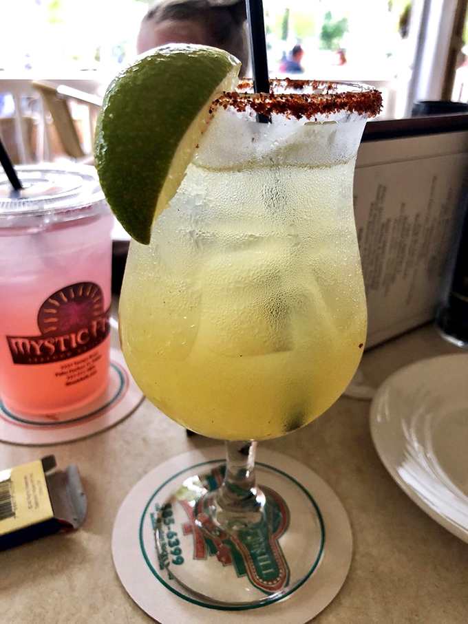 A margarita with the perfect salt rim and lime wedge&mdash;the kind of drink that makes you wonder why you don't live at the beach year-round.
