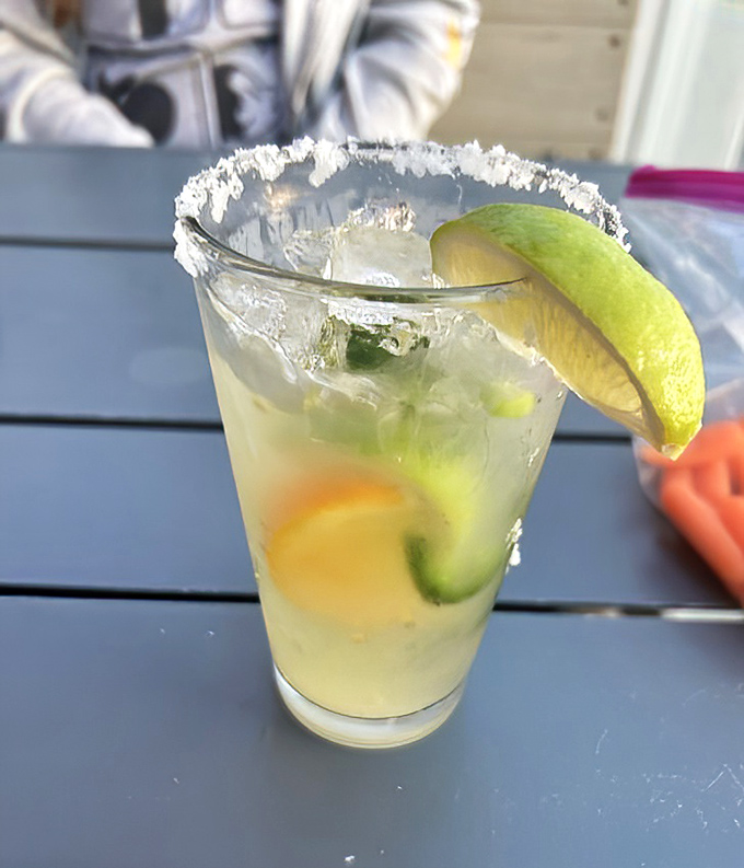 A margarita that whispers "beach day" louder than Jimmy Buffett's entire discography &ndash; salt rim mandatory, worries optional.
