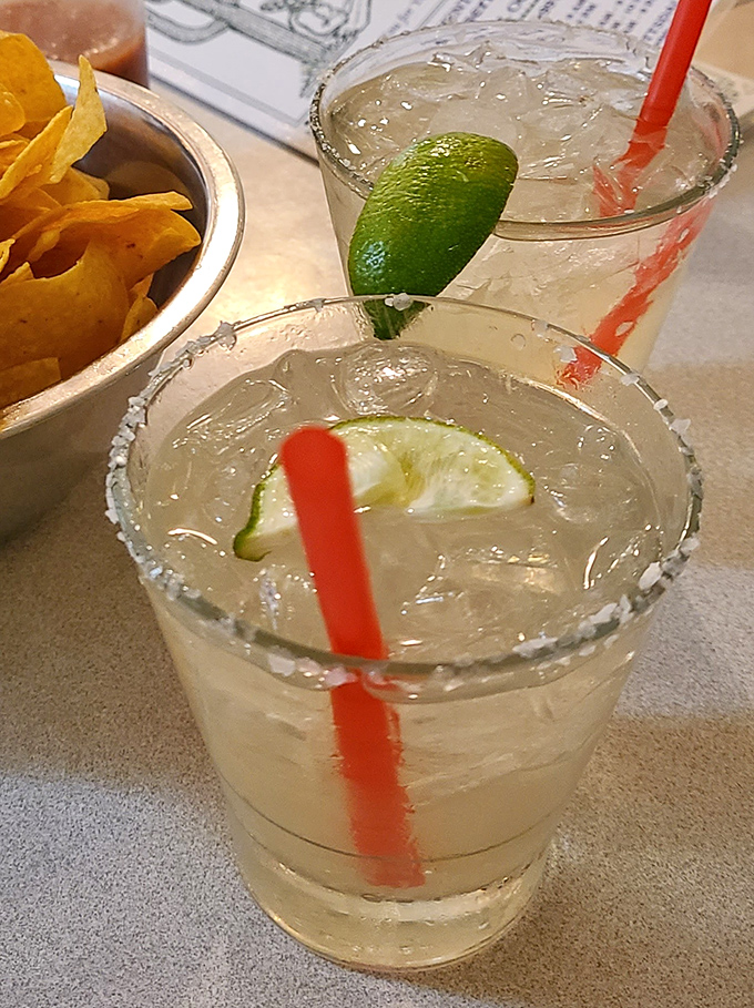 Margaritas with salt-rimmed glasses and fresh lime&mdash;because sometimes adult beverages deserve as much attention to detail as the main course.