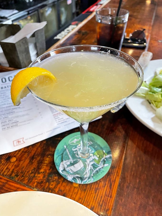 A martini that sparkles like coastal morning light, with that perfect salt rim and citrus twist saying "vacation starts now."