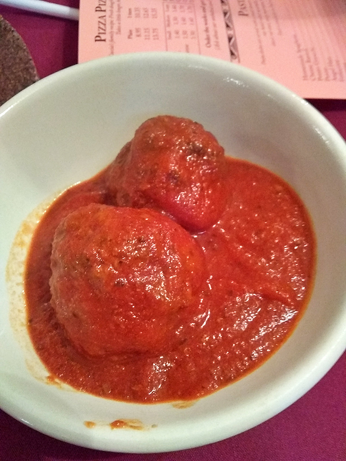Homemade meatballs swimming in rich sauce &ndash; the kind of comfort food that makes everything better instantly.