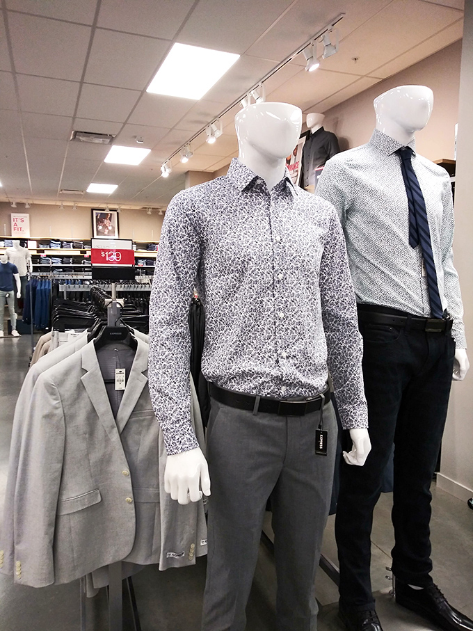 Mannequins showing off business casual perfection, silently judging your current wardrobe choices from their pedestal perch.