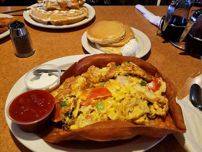 This isn't just an omelet &ndash; it's a tortilla bowl fiesta where eggs, cheese, and vegetables have gathered to throw the best party your taste buds will attend all day.
