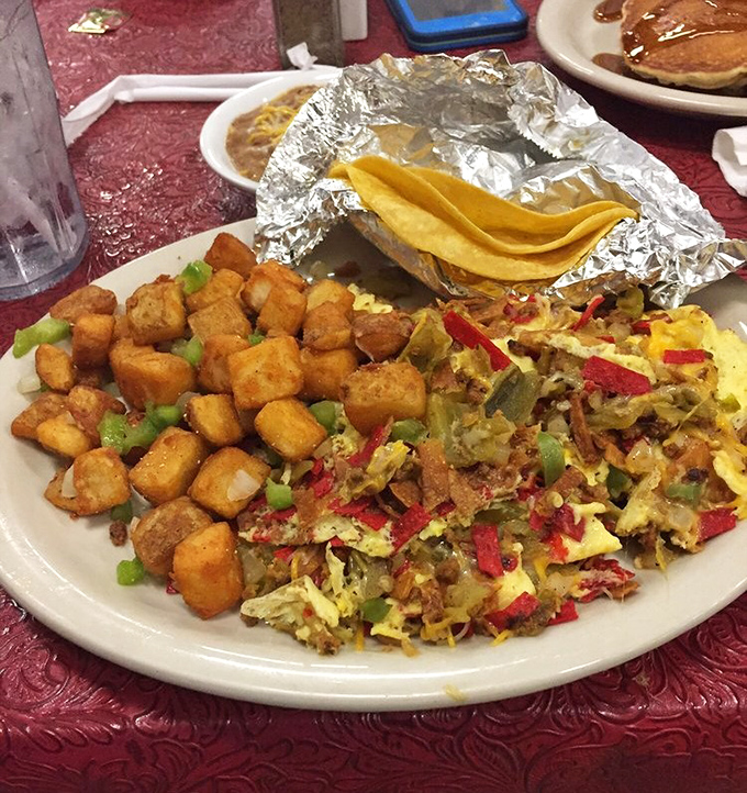 Breakfast with attitude: potatoes crisped to perfection alongside a colorful scramble that's like the Texas landscape on a plate&mdash;vibrant, varied, and satisfying.
