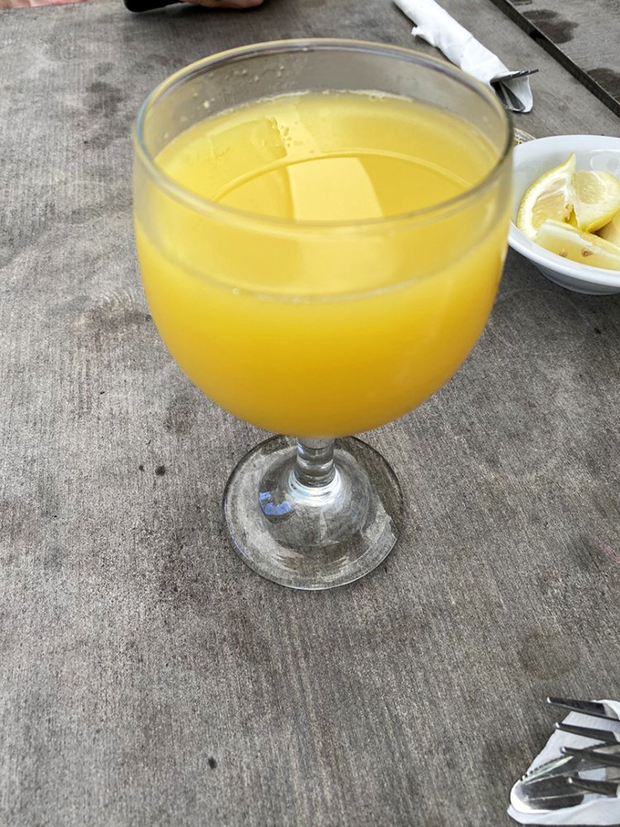 Nothing says "vacation mode activated" quite like a mimosa at breakfast. Sunshine in a glass to match the restaurant's cheery vibe.