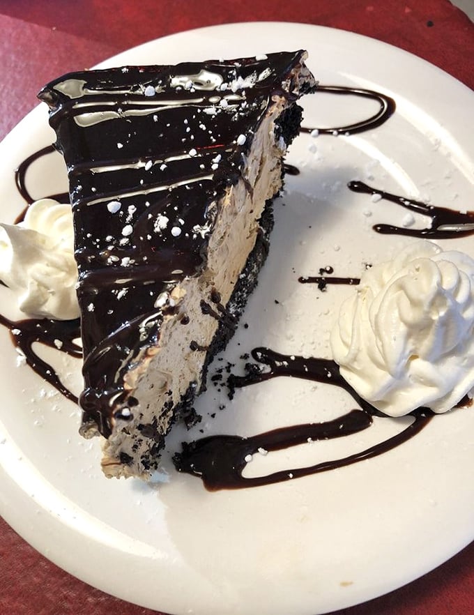Mississippi Mud Pie that's darker than midnight and richer than Bezos—with whipped cream islands floating in chocolate seas.