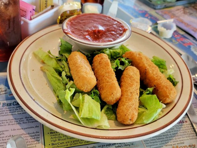 Mozzarella sticks: the diplomatic peacekeepers between hunger and happiness. That marinara looks like it means business.
