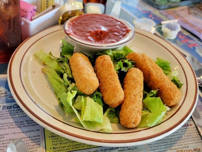 Mozzarella sticks: the diplomatic peacekeepers between hunger and happiness. That marinara looks like it means business.