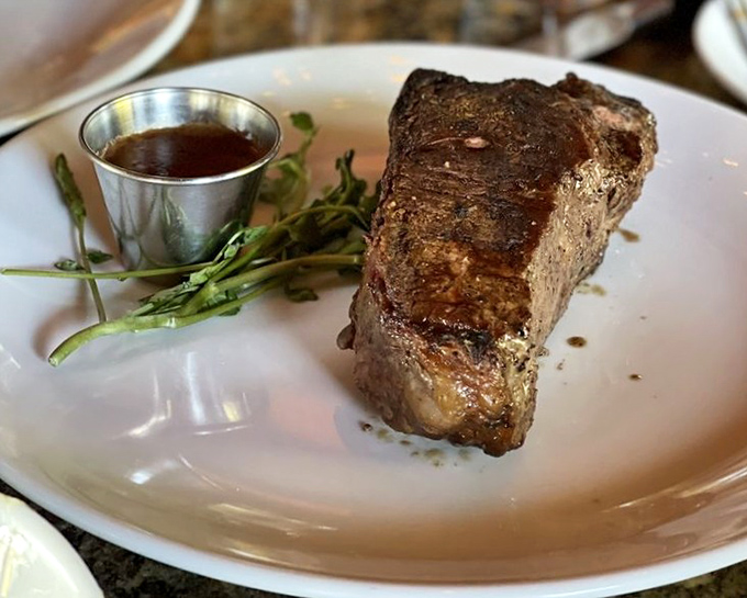 NY Strip with a side of au jus that could make a vegetarian question their life choices. Perfectly seared, impeccably seasoned, utterly irresistible.