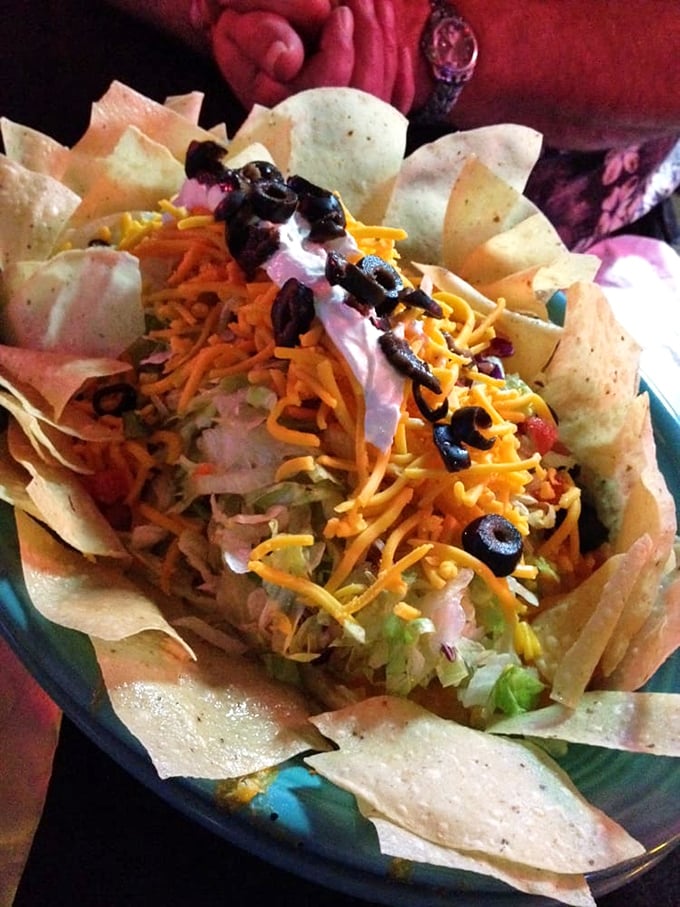 The taco salad arrives like an edible art installation &ndash; a crispy tortilla bowl cradling layers of Tex-Mex goodness that's as photogenic as it is delicious.