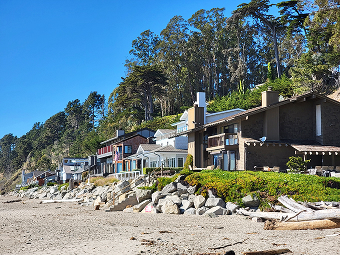 Beach homes perched above the shoreline offer a daily reminder that coastal living isn't just about location&mdash;it's about embracing nature's ever-changing canvas.