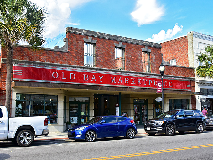 Old Bay Marketplace invites shoppers with its bright red sign and promise of local treasures. A one-stop shop for Beaufort souvenirs and specialties.