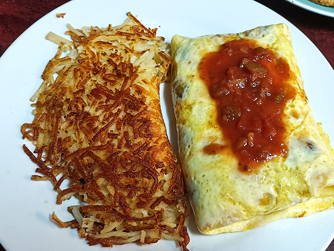 An omelet that's seen the inside of a skilled pan and hash browns crisped to perfection &ndash; breakfast harmony achieved.