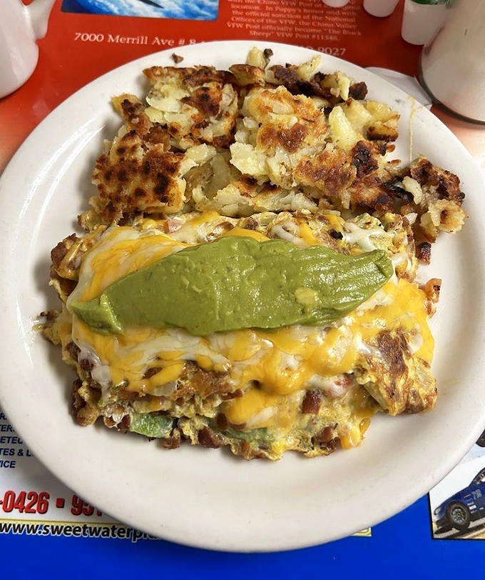 An omelet that doesn't just contain ingredients&mdash;it celebrates them, with melted cheese and avocado playing the starring roles in this breakfast drama.