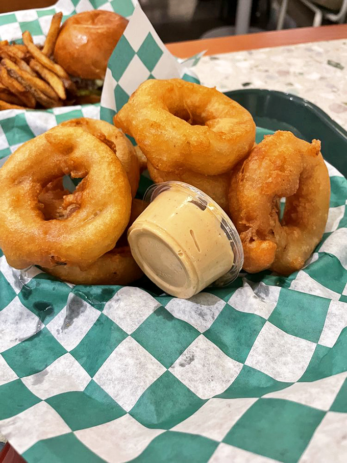 These onion rings aren't just appetizers&mdash;they're golden halos of happiness. The dipping sauce is just the celestial bonus.