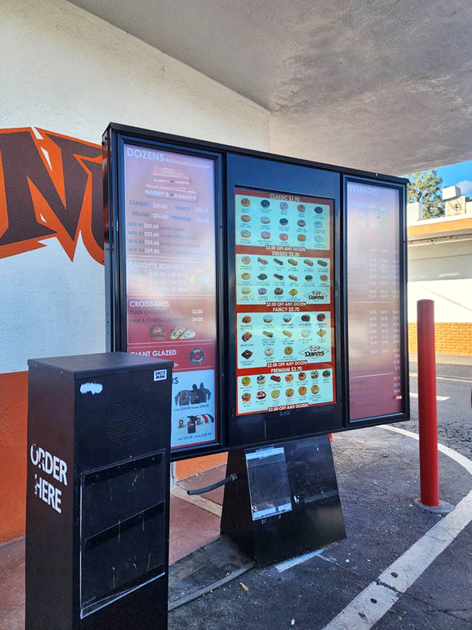 The outdoor ordering area&mdash;where strangers become temporary friends united by a common mission: securing the perfect donut.